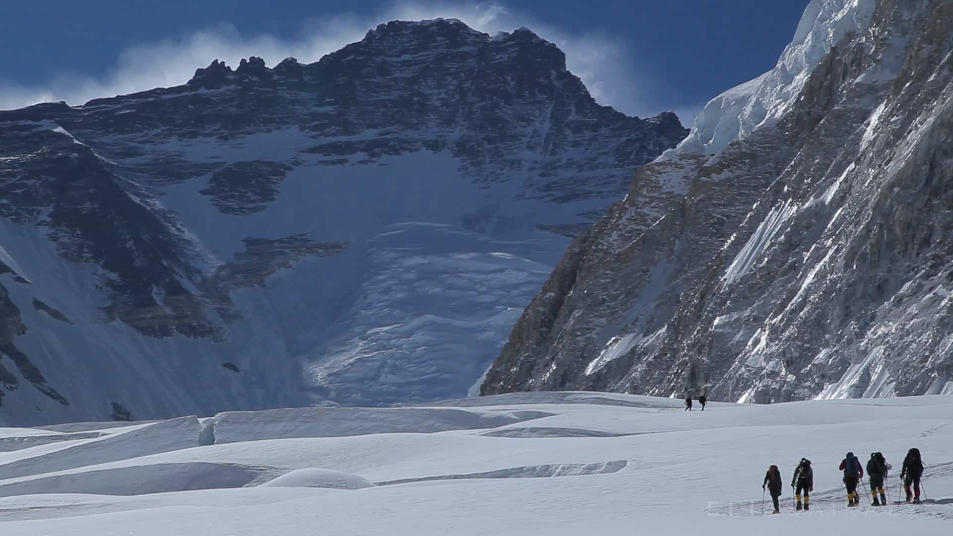 Extreme wideshot of team approaching the Lhotse Face - Elia Saikaly ...