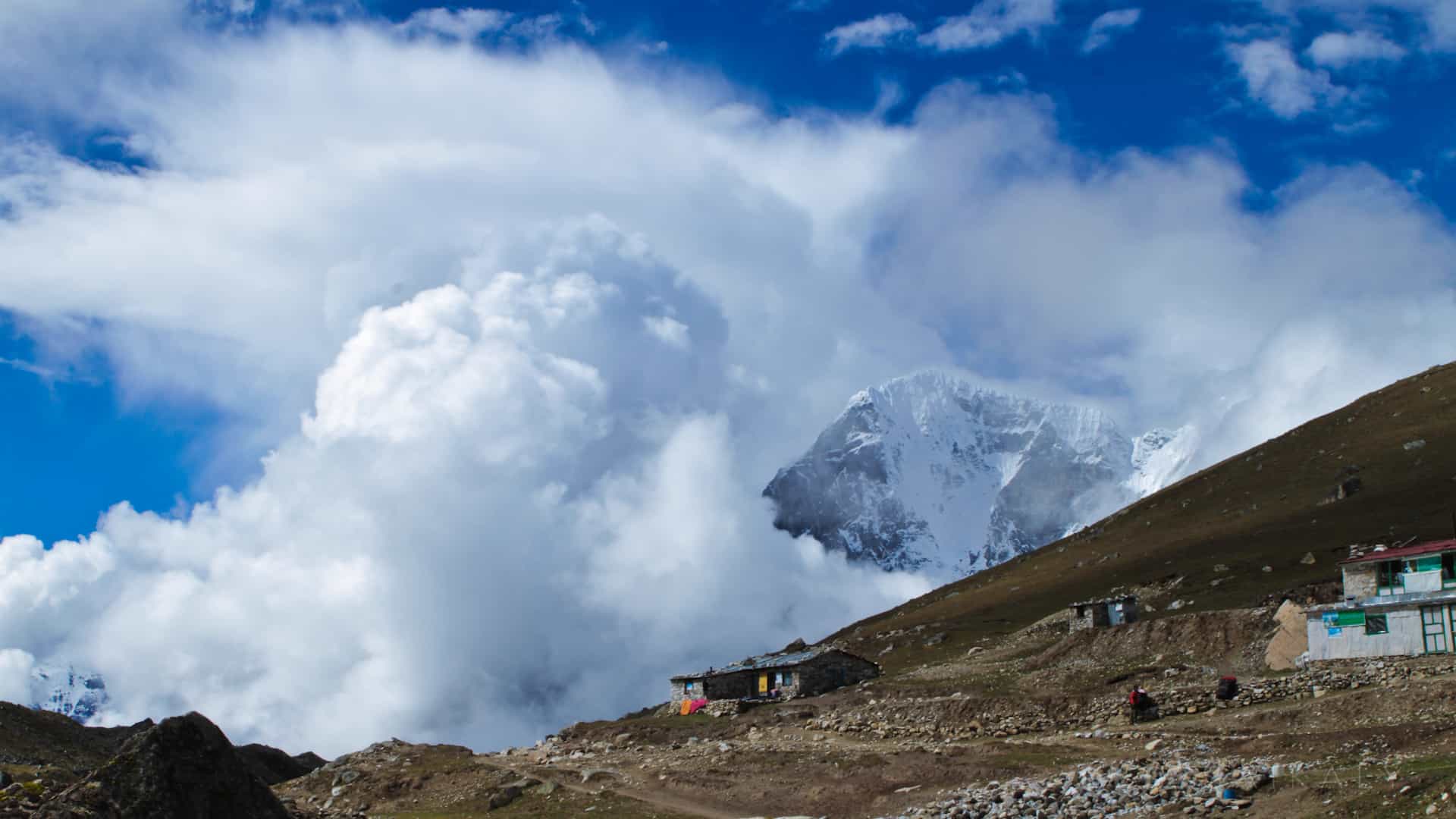 Lobuche summit from the village of Lobuche with heavy clouds - Elia ...