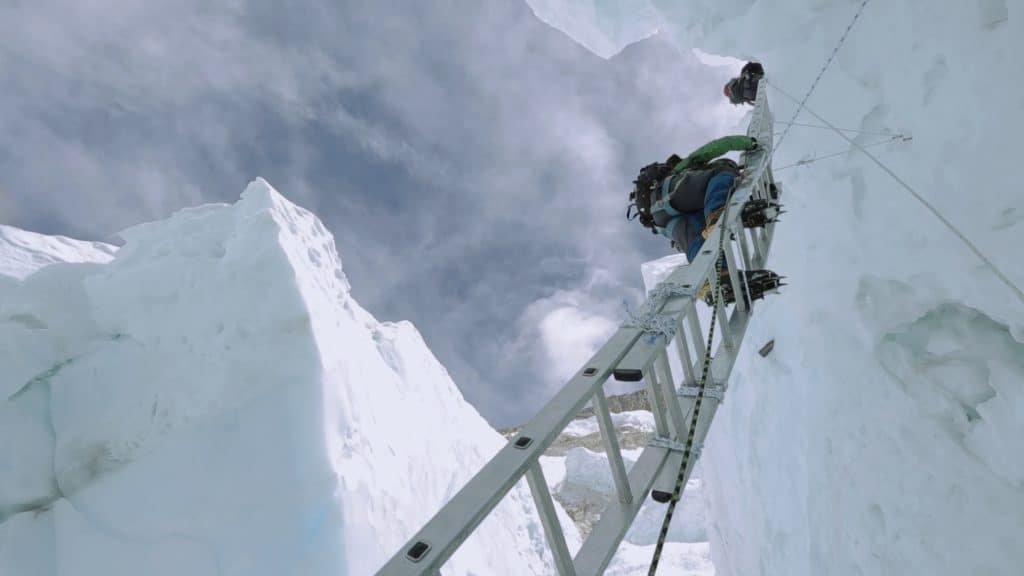 Dangerous ladder descent in the Khumbu Icefall - Elia Saikaly Licensing