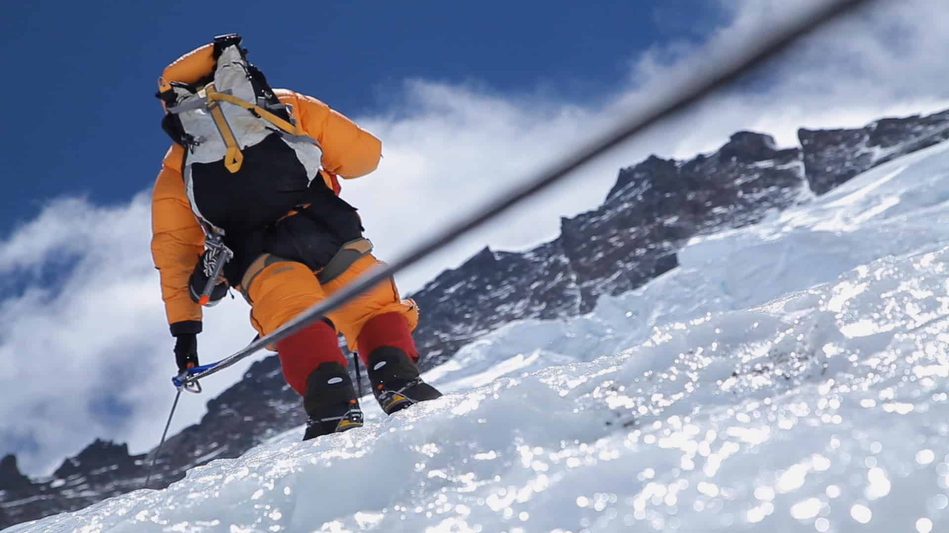 Medium shot of Sherpa climbing the Lhotse face from behind - Elia ...